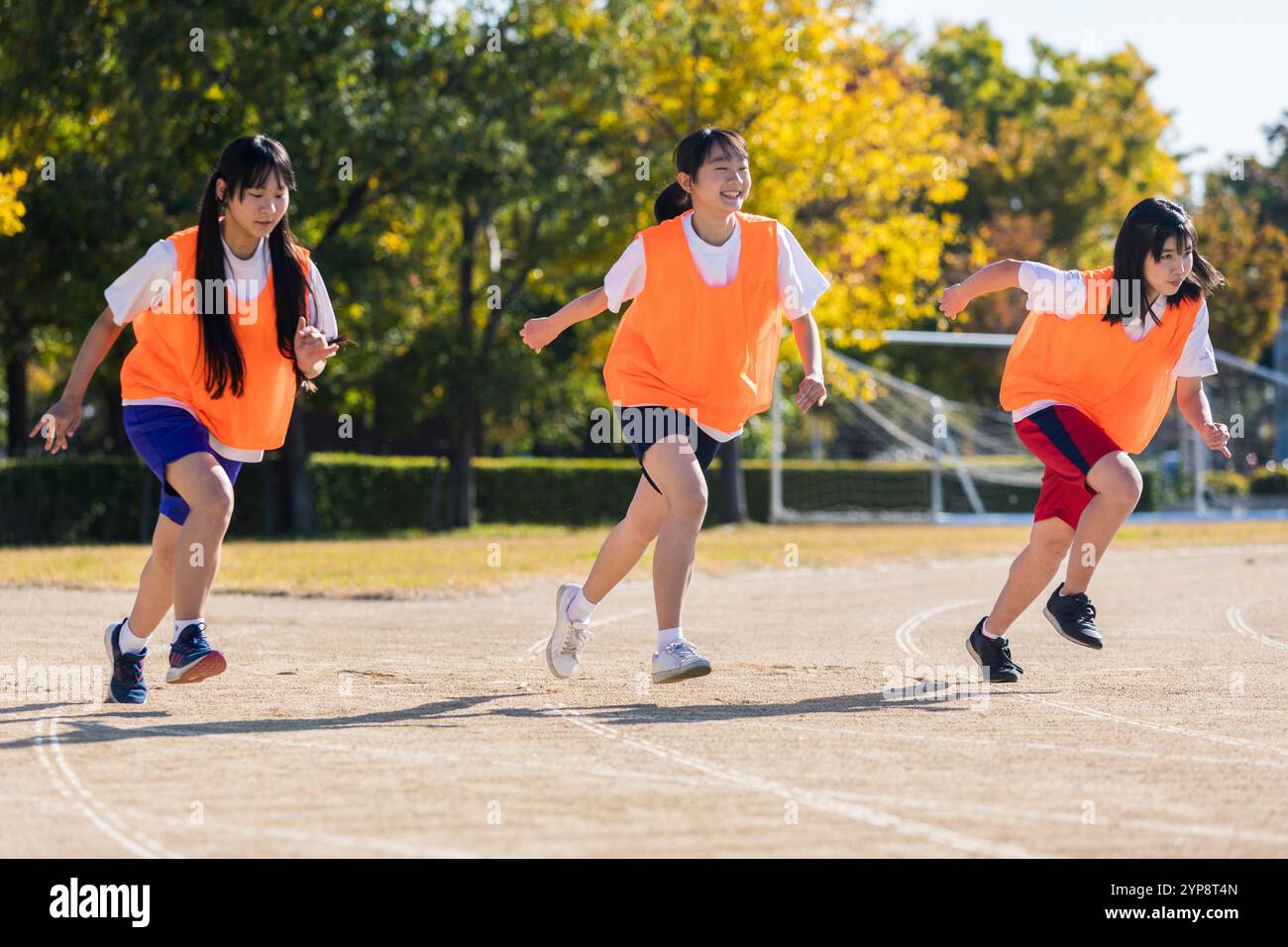 High school students running Stock Photo - Alamy