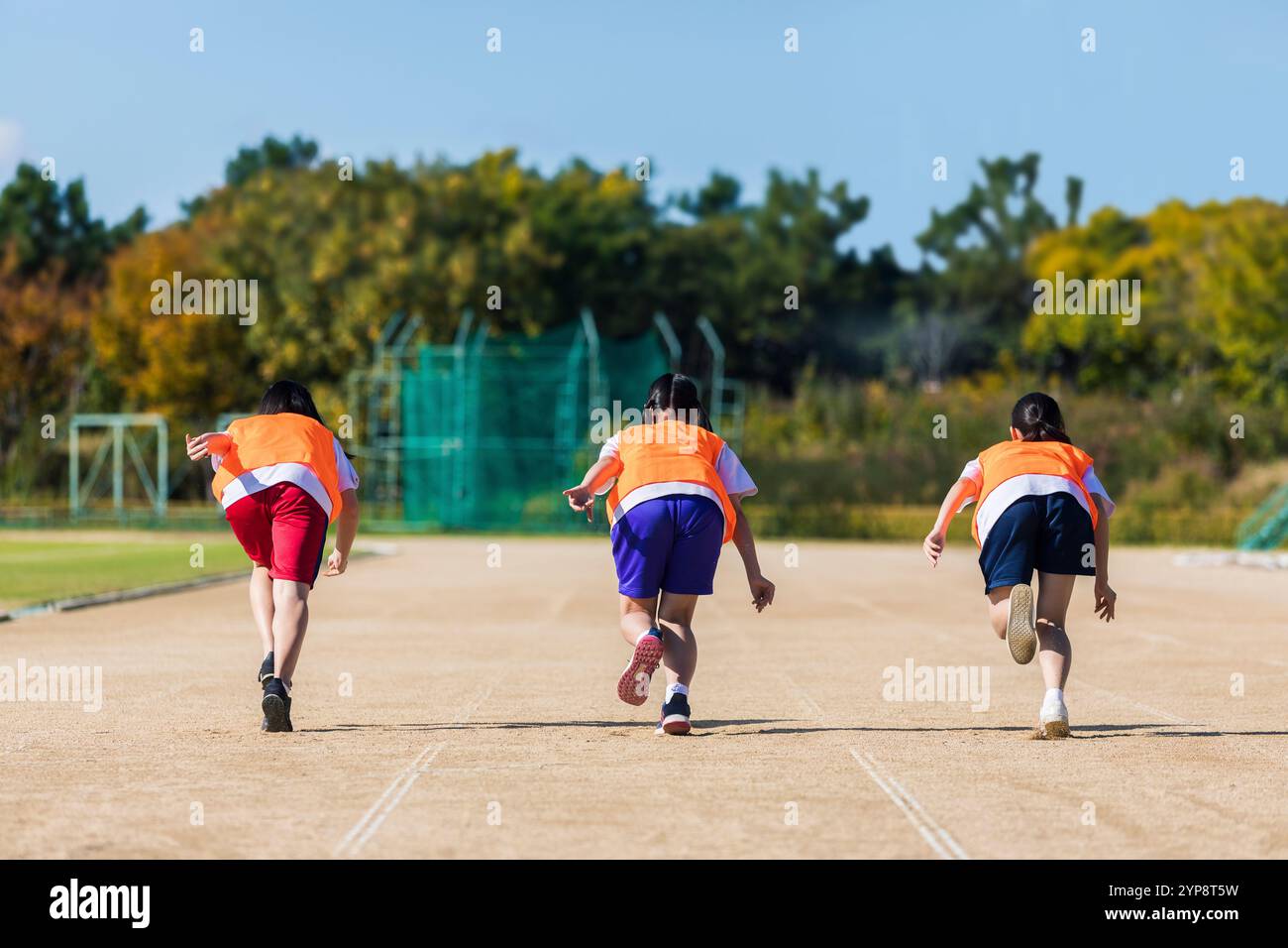 High school student running out Stock Photo - Alamy