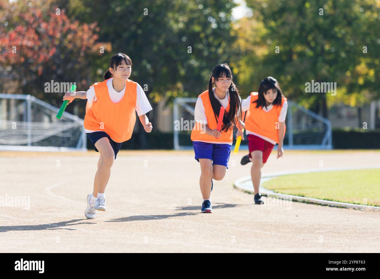 Student running relay hi-res stock photography and images - Alamy