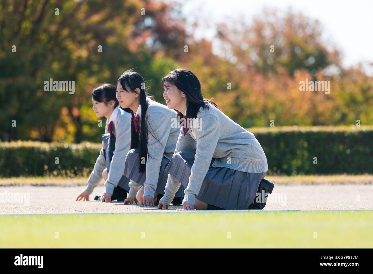 High school students lining up at the start line Stock Photo - Alamy