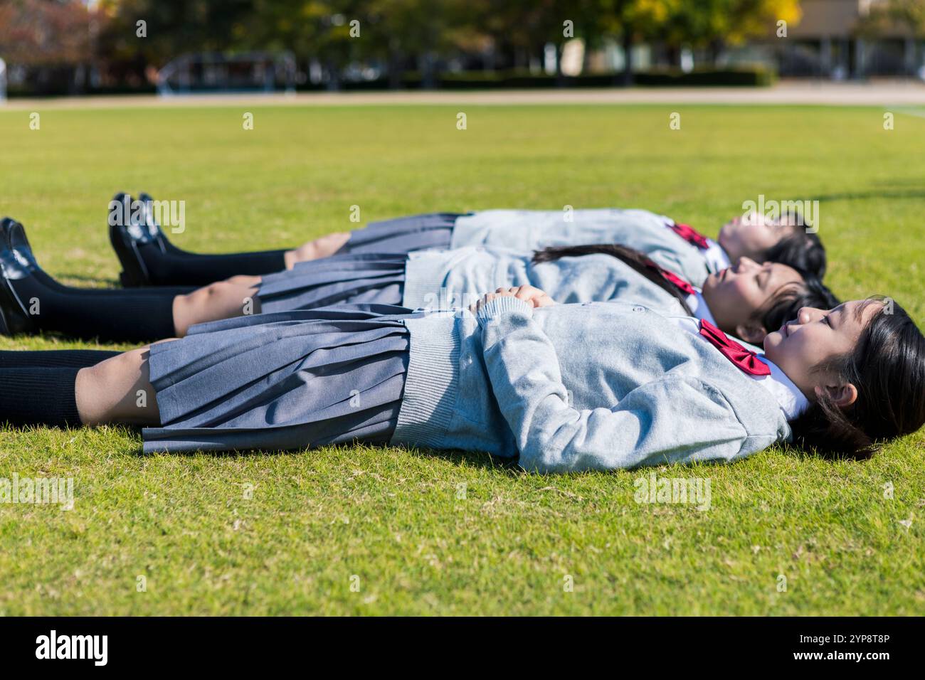High school girl lying down hi-res stock photography and images - Alamy