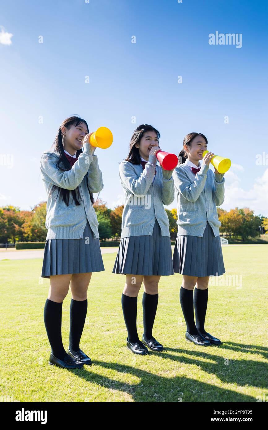 Cheering high school students Stock Photo - Alamy