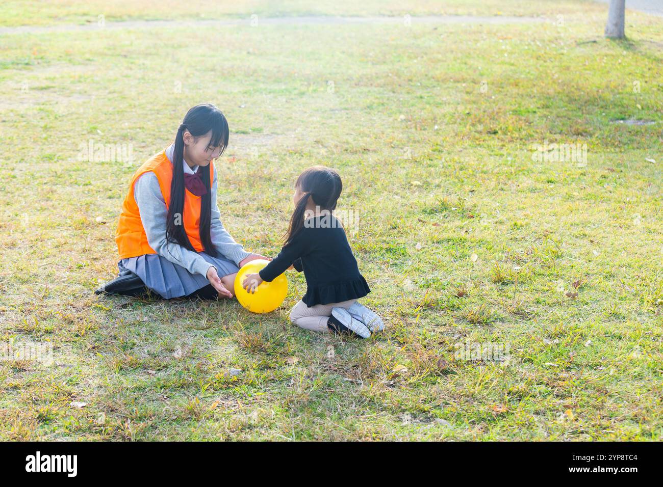 Children playing ball smile hi-res stock photography and images - Alamy