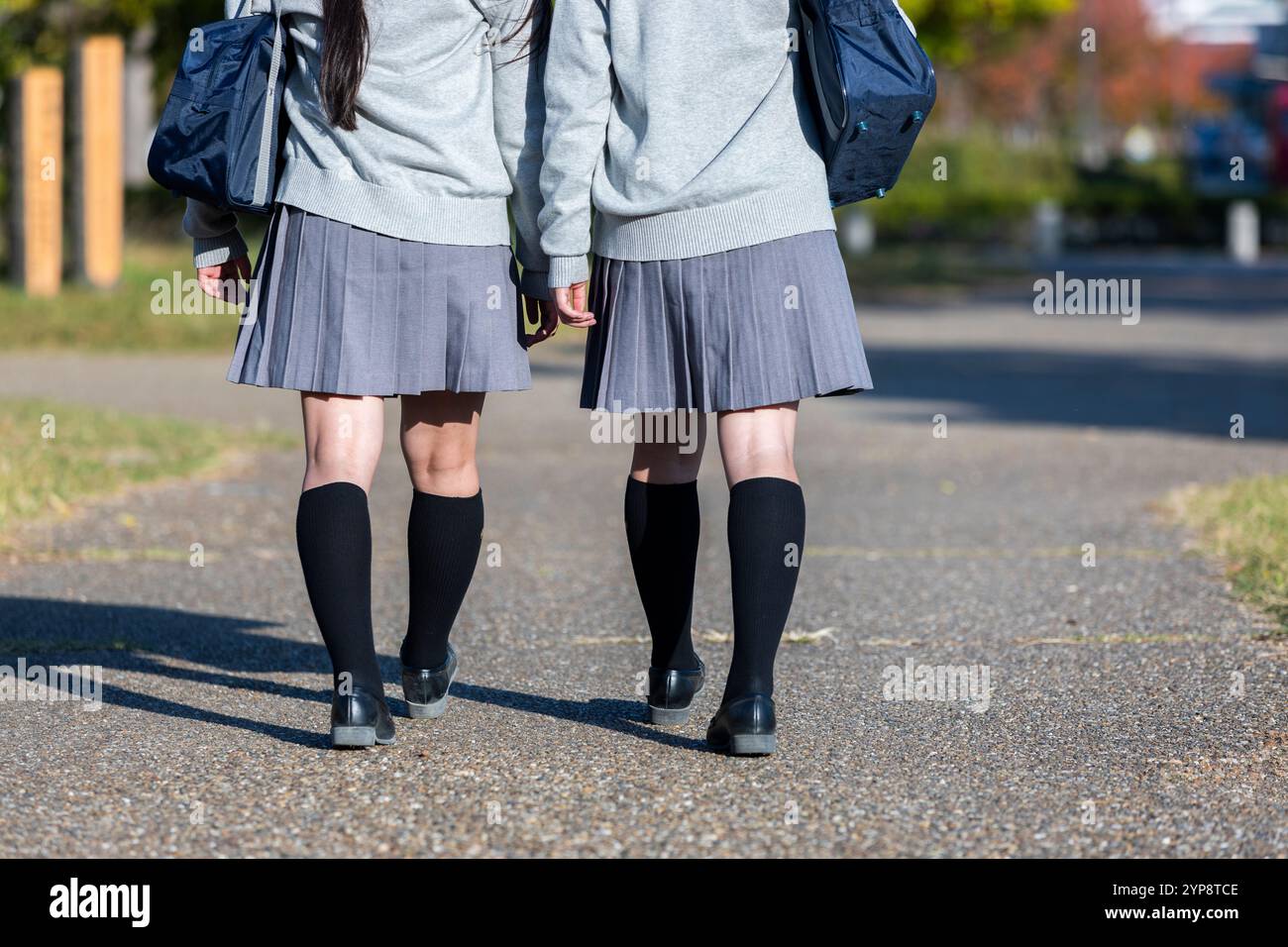 High school students leaving school Stock Photo - Alamy