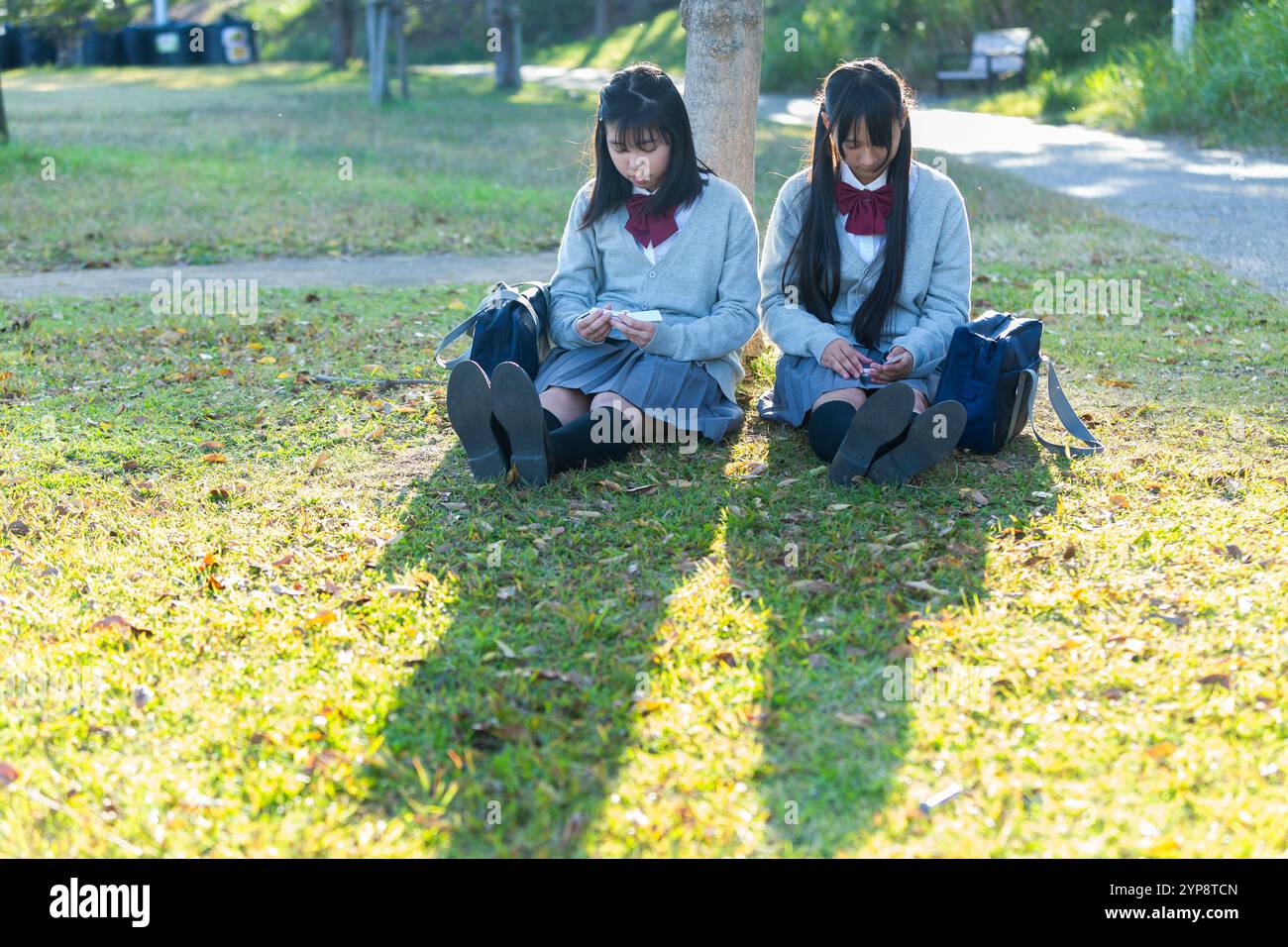 Two girls walk school in hi-res stock photography and images - Alamy