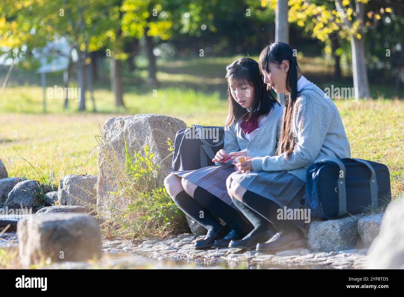 Two girls walk school in hi-res stock photography and images - Alamy