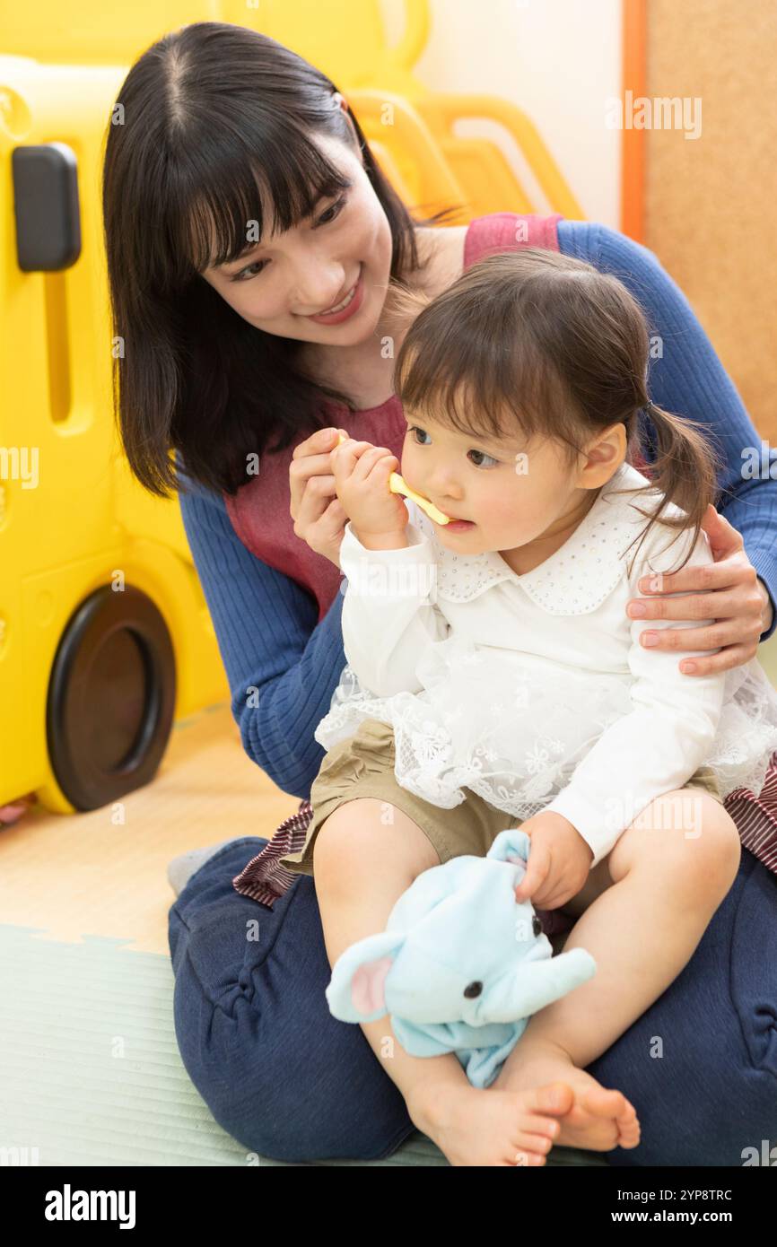 Teaching brushing hi-res stock photography and images - Alamy