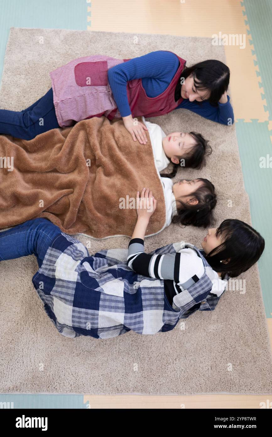 Nursery school children taking a nap Stock Photo - Alamy