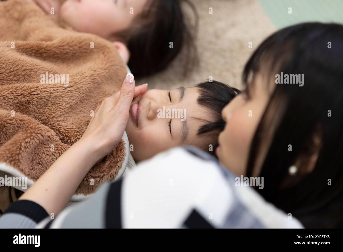 Nursery school children taking a nap Stock Photo - Alamy