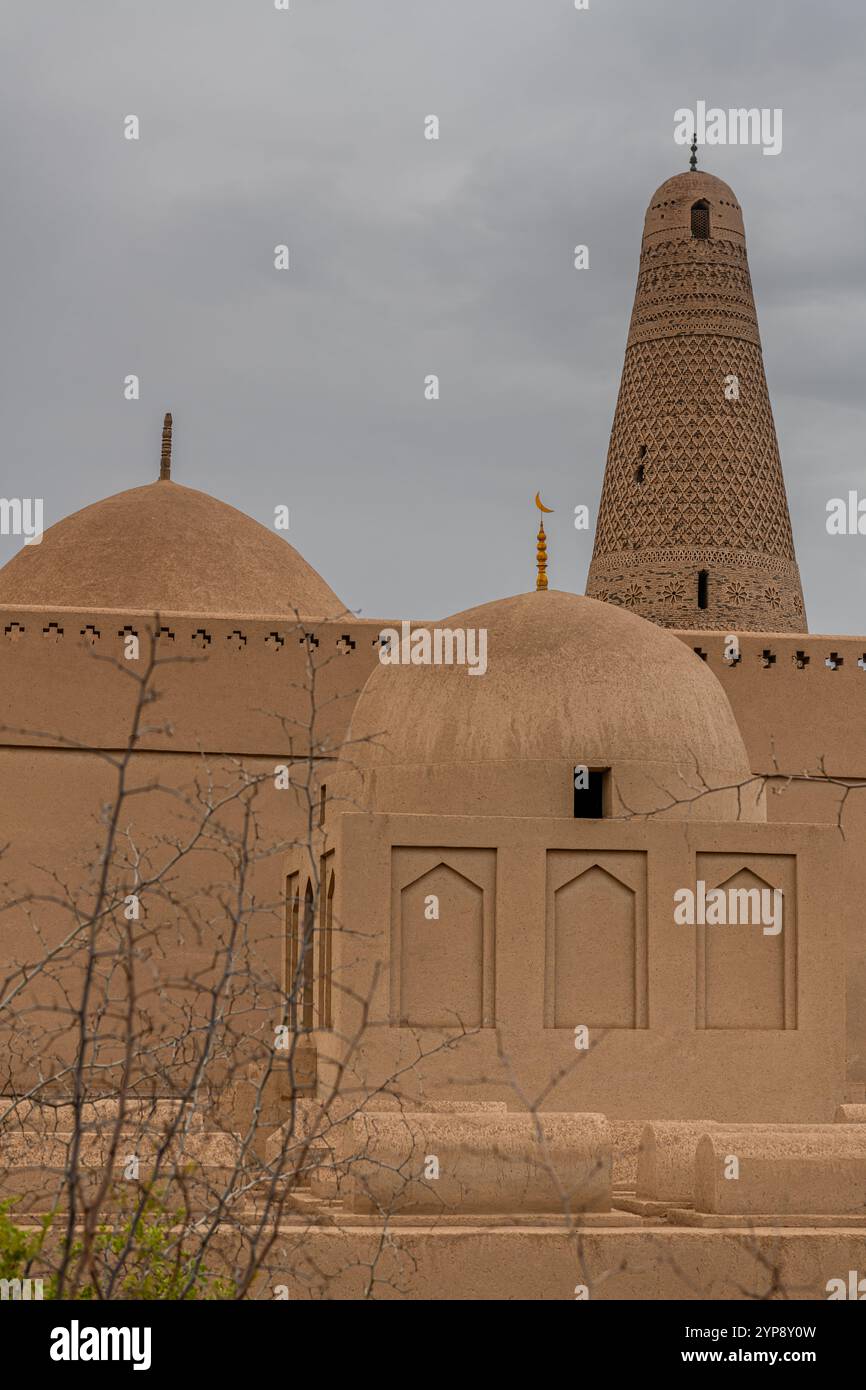 The Emin minaret and Uyghur mosque visible from behind the tombs in ...