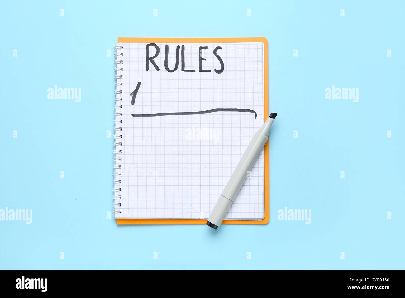 Notebook with blank list of rules and marker on blue background Stock ...