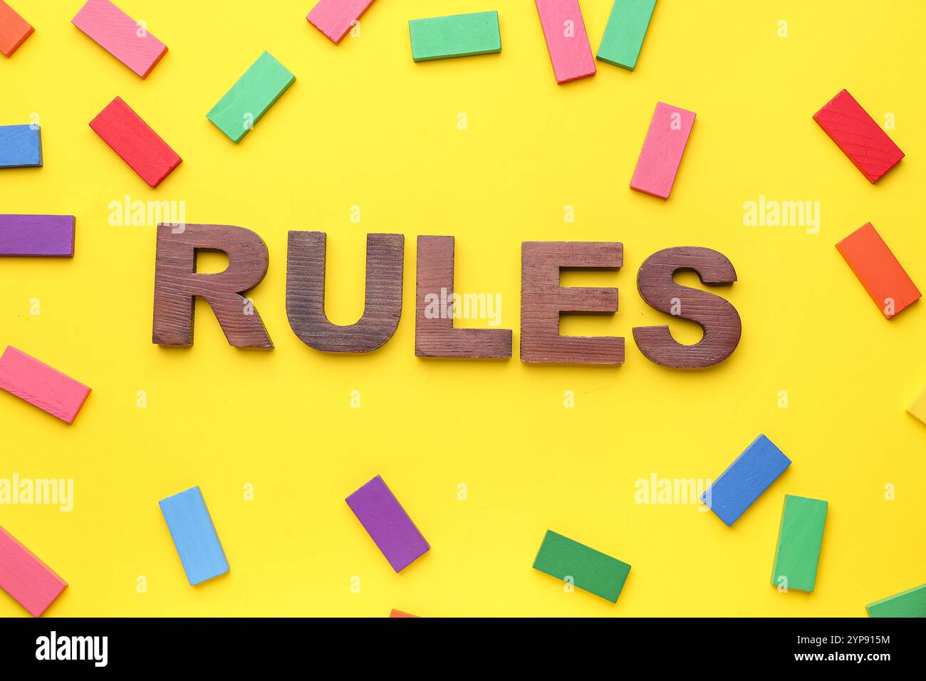 Word RULES with blocks on yellow background Stock Photo - Alamy