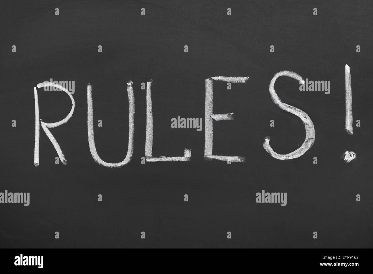 Word RULES with exclamation mark on blackboard Stock Photo - Alamy