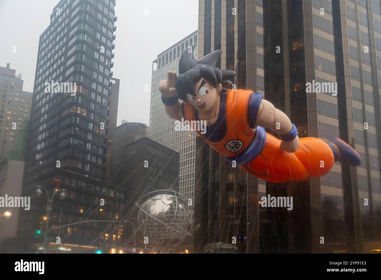 Dragon Ball/Toei Animation's Goku balloon moves through the Macy's ...