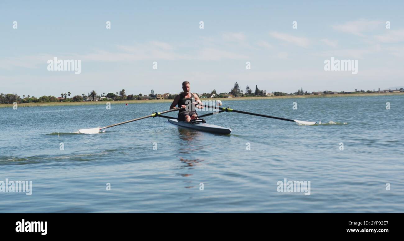 Man rowing boat hi-res stock photography and images - Alamy