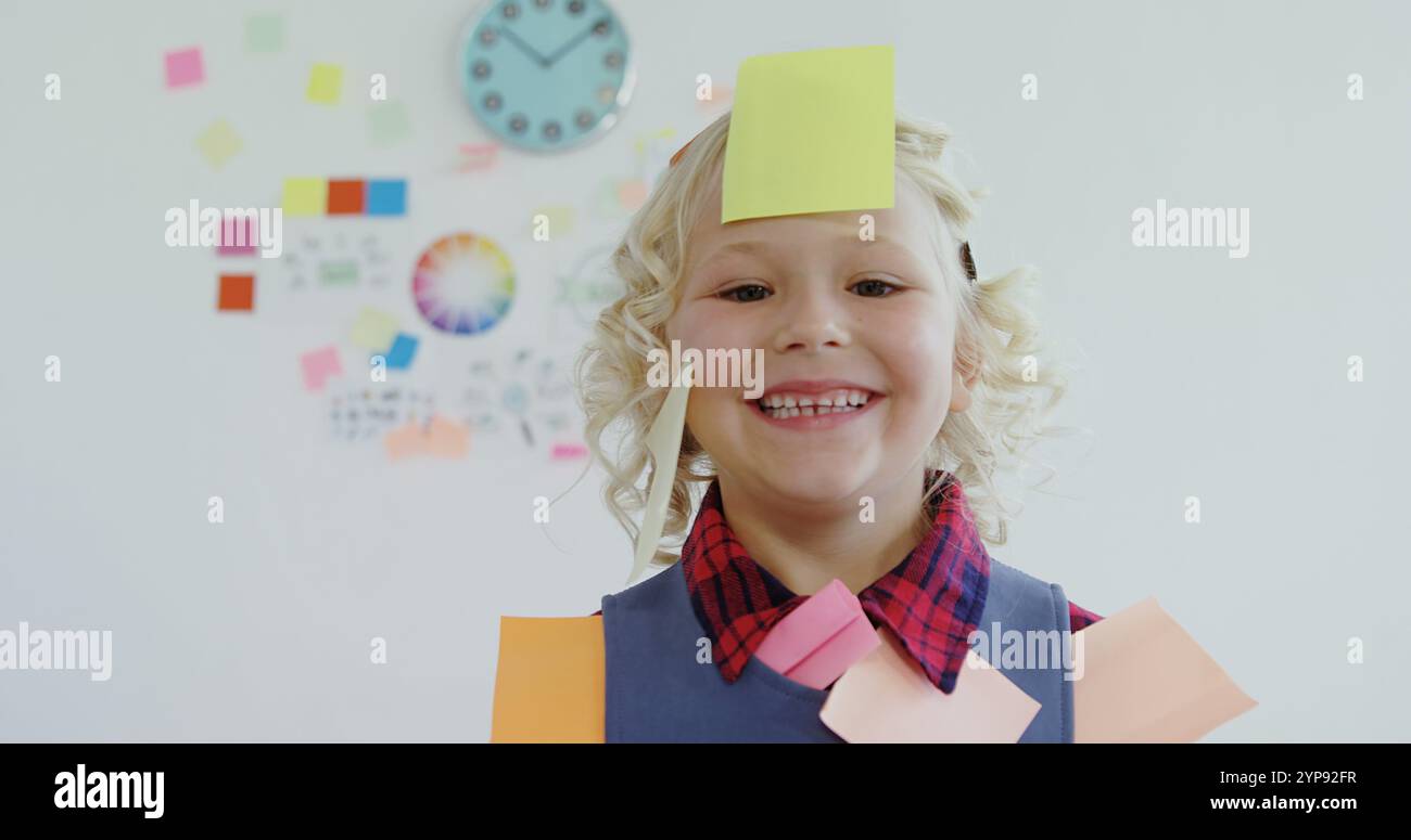 Kid as business executive with sticky notes on his body at office 4k ...