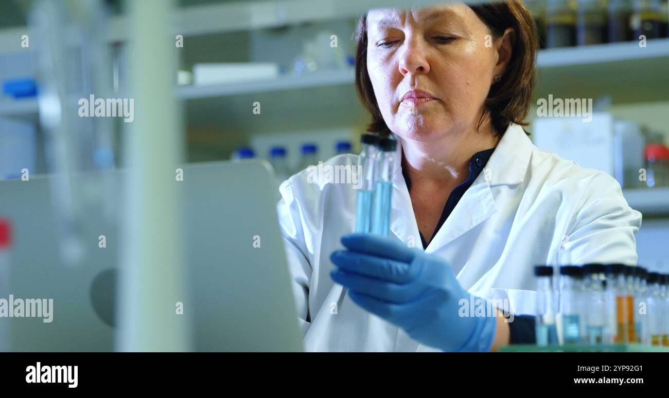 Laboratory test tubes solutions hi-res stock photography and images - Alamy