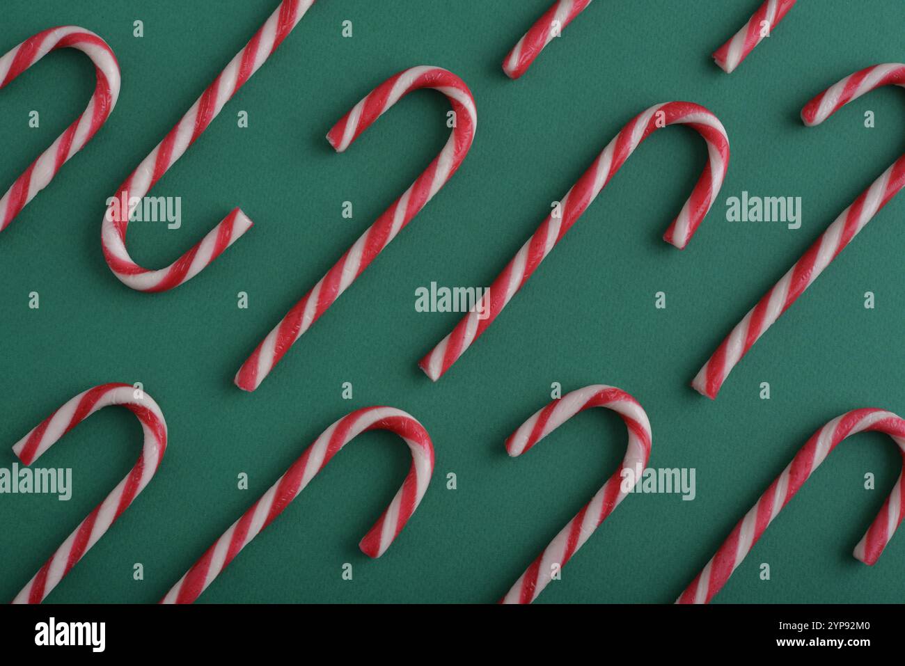 Top view image capturing multiple red and white striped candy canes ...