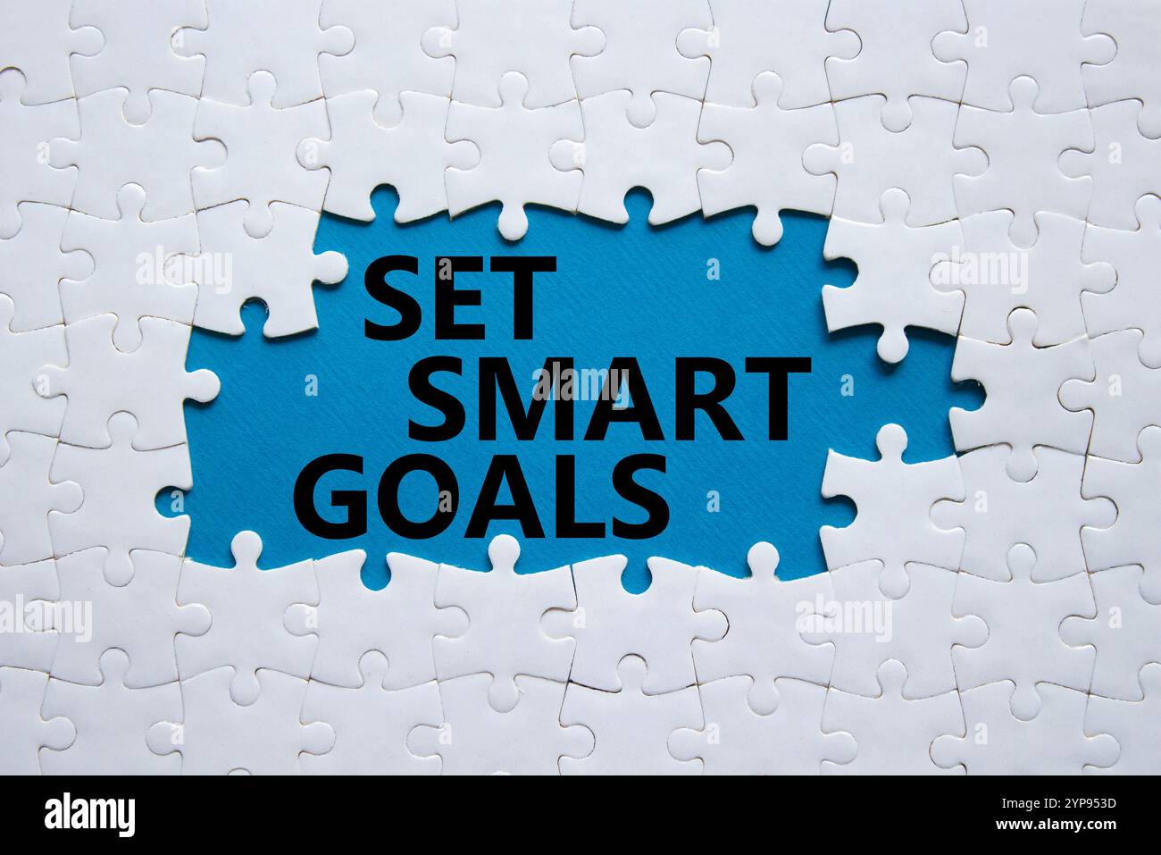 Set smart goals symbol. Concept words Set smart goals on white puzzle ...