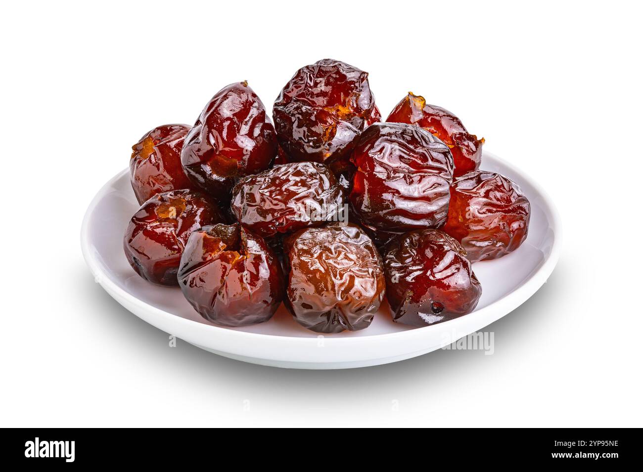 Pile of sweet pitted chinese jujube fruit preserved in syrup in white ...