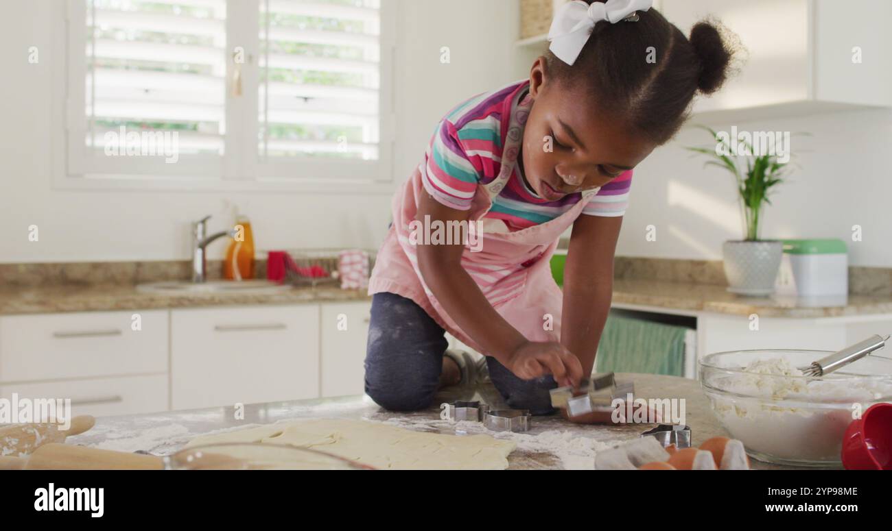 Girl using cookie cutters hi-res stock photography and images - Alamy