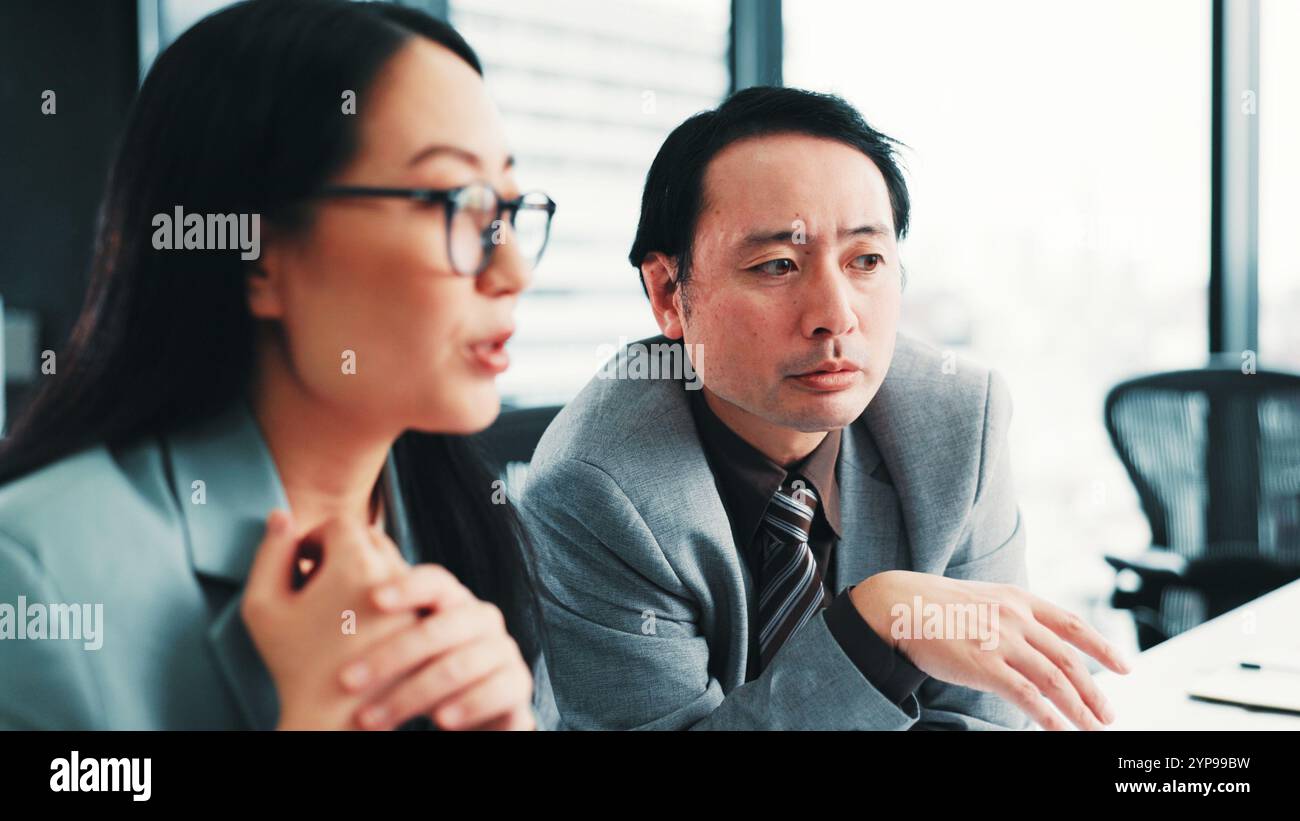 Help, manager and Asian business people in office with feedback, review ...