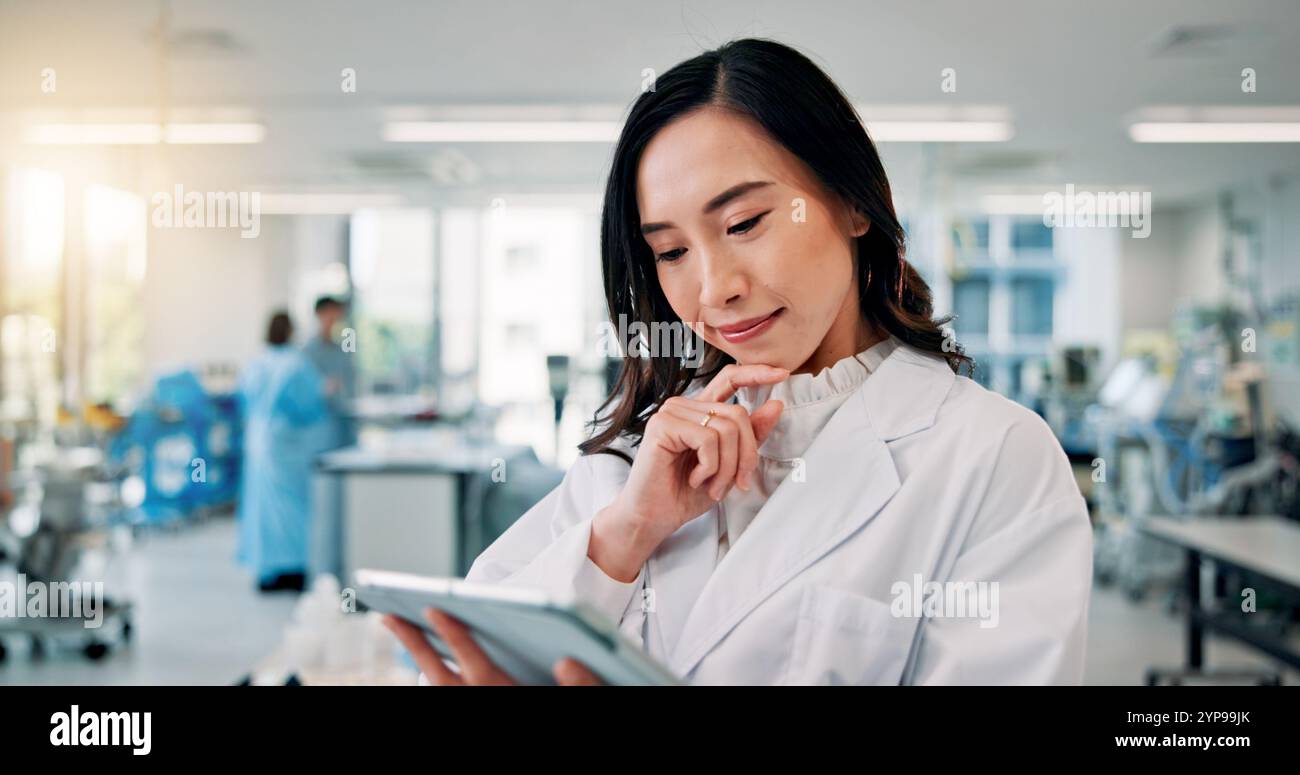 Scientist woman tablet thinking hi-res stock photography and images - Alamy