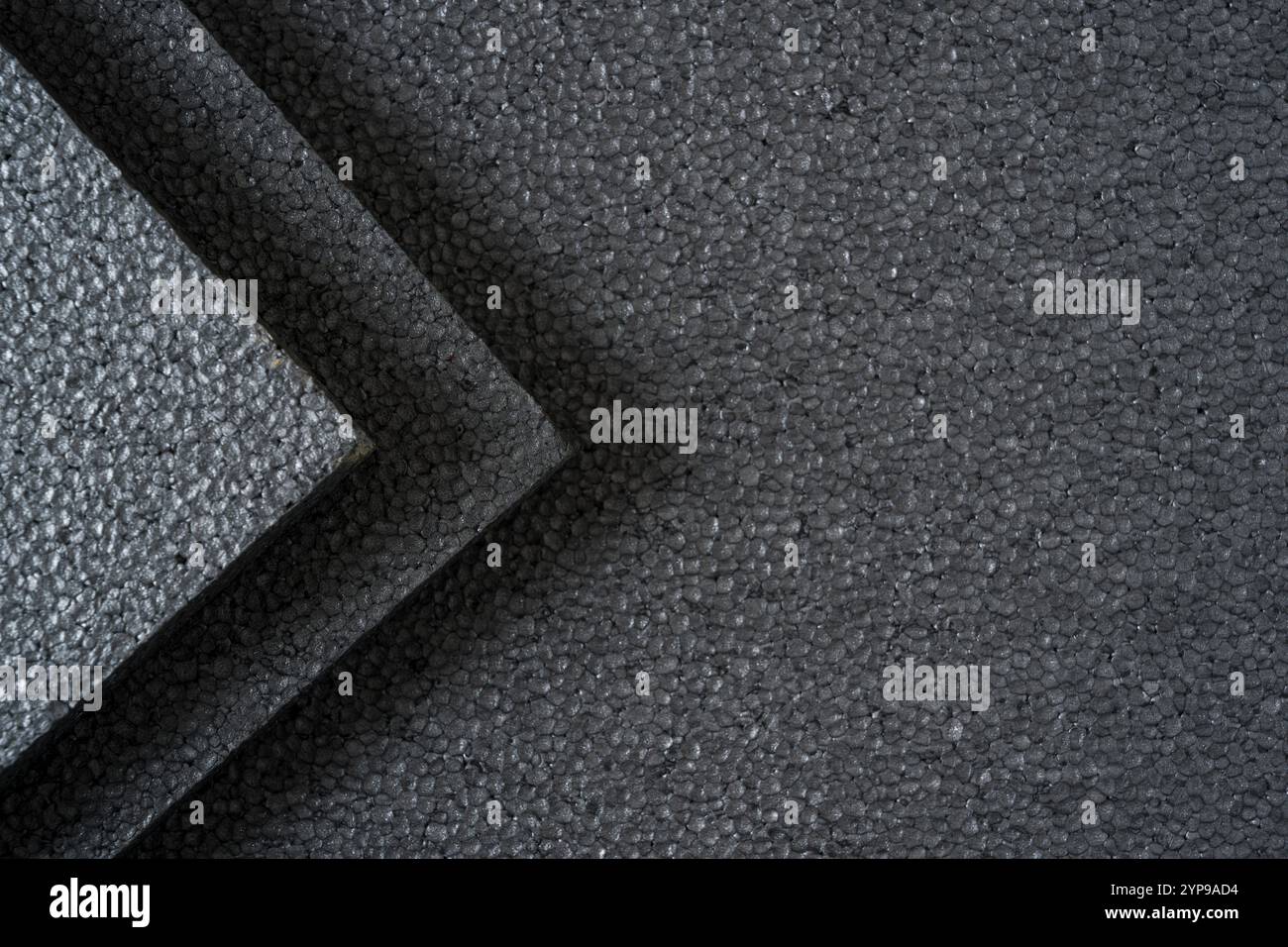 Top view of grey thermal insulation styrofoam sheets stacked on top of ...