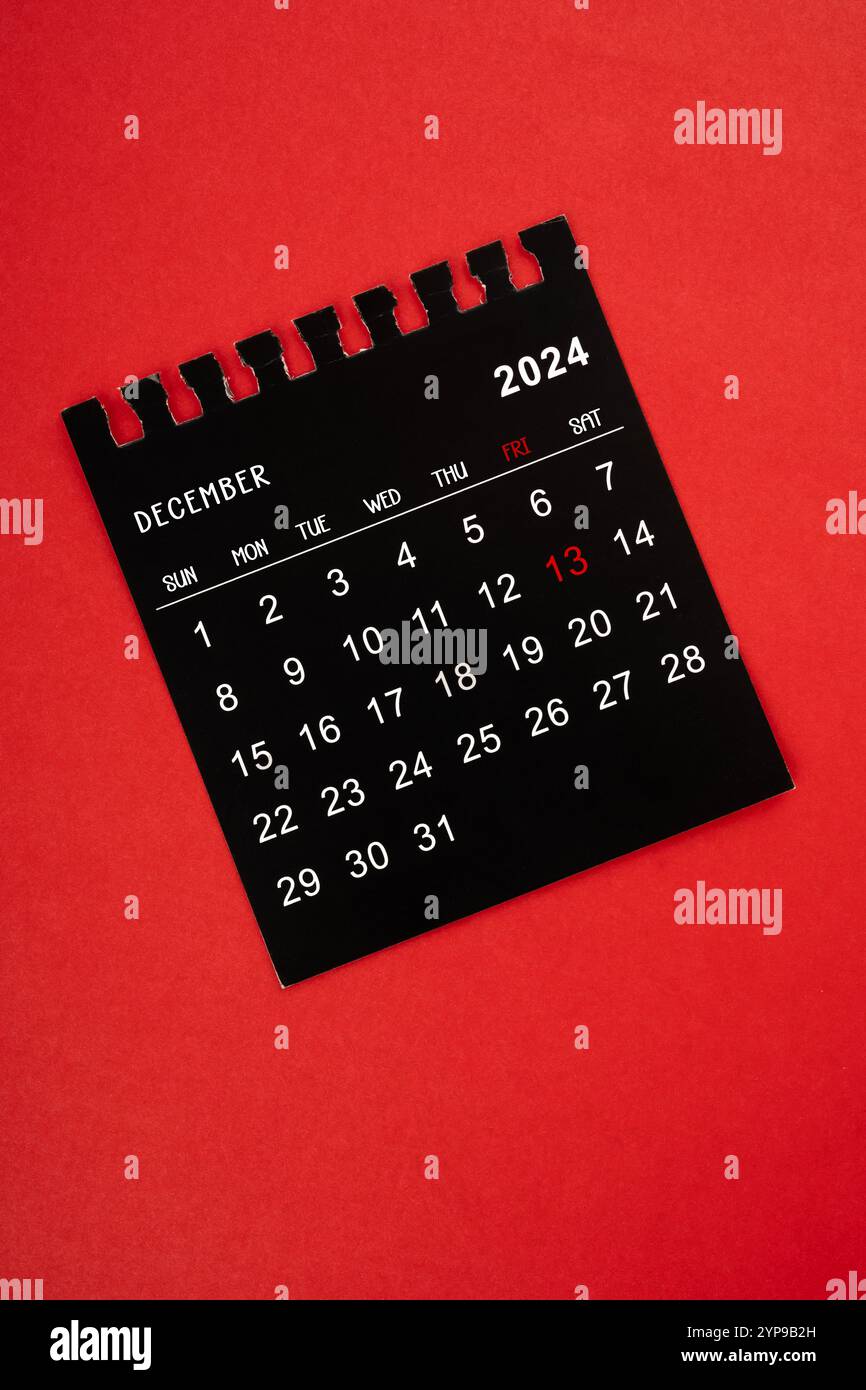 Black calendar December 2024 focus on friday 13, On red background ...