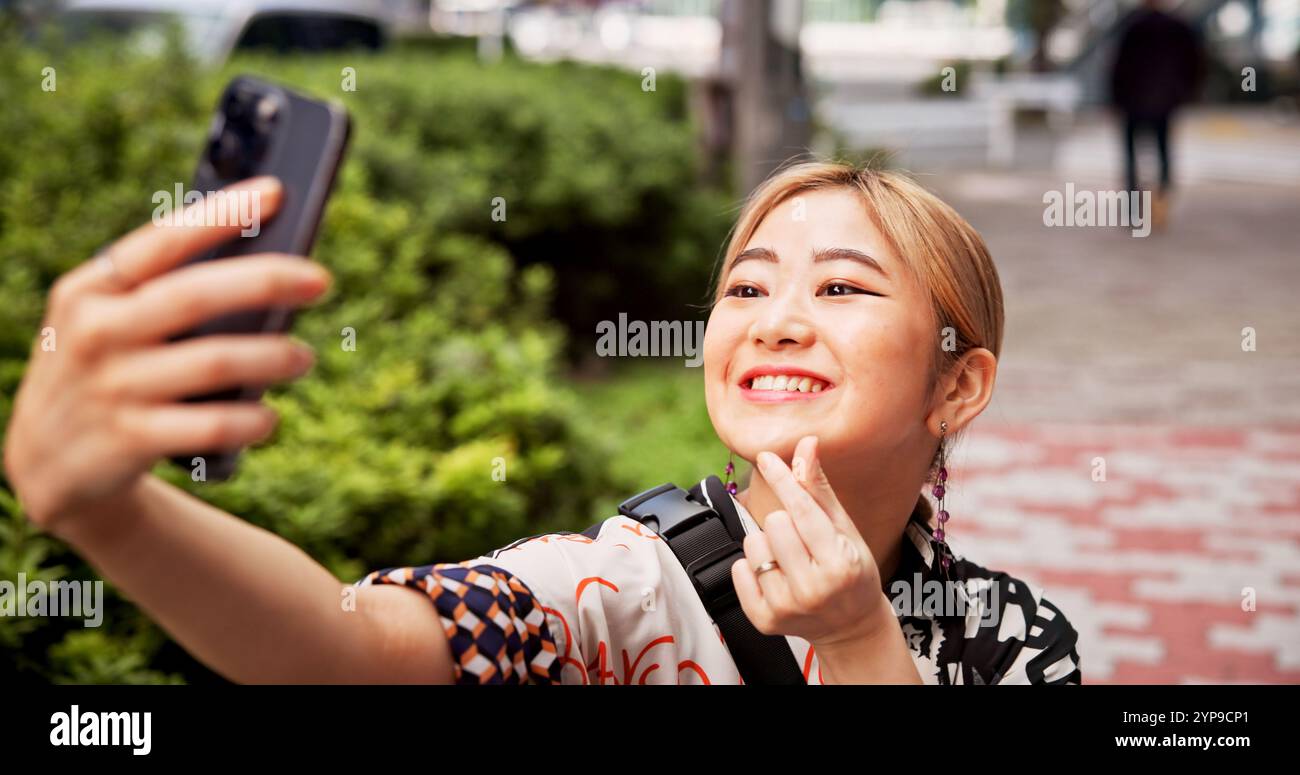 Selfie, smile and woman in nature, gesture and happy for memory on ...
