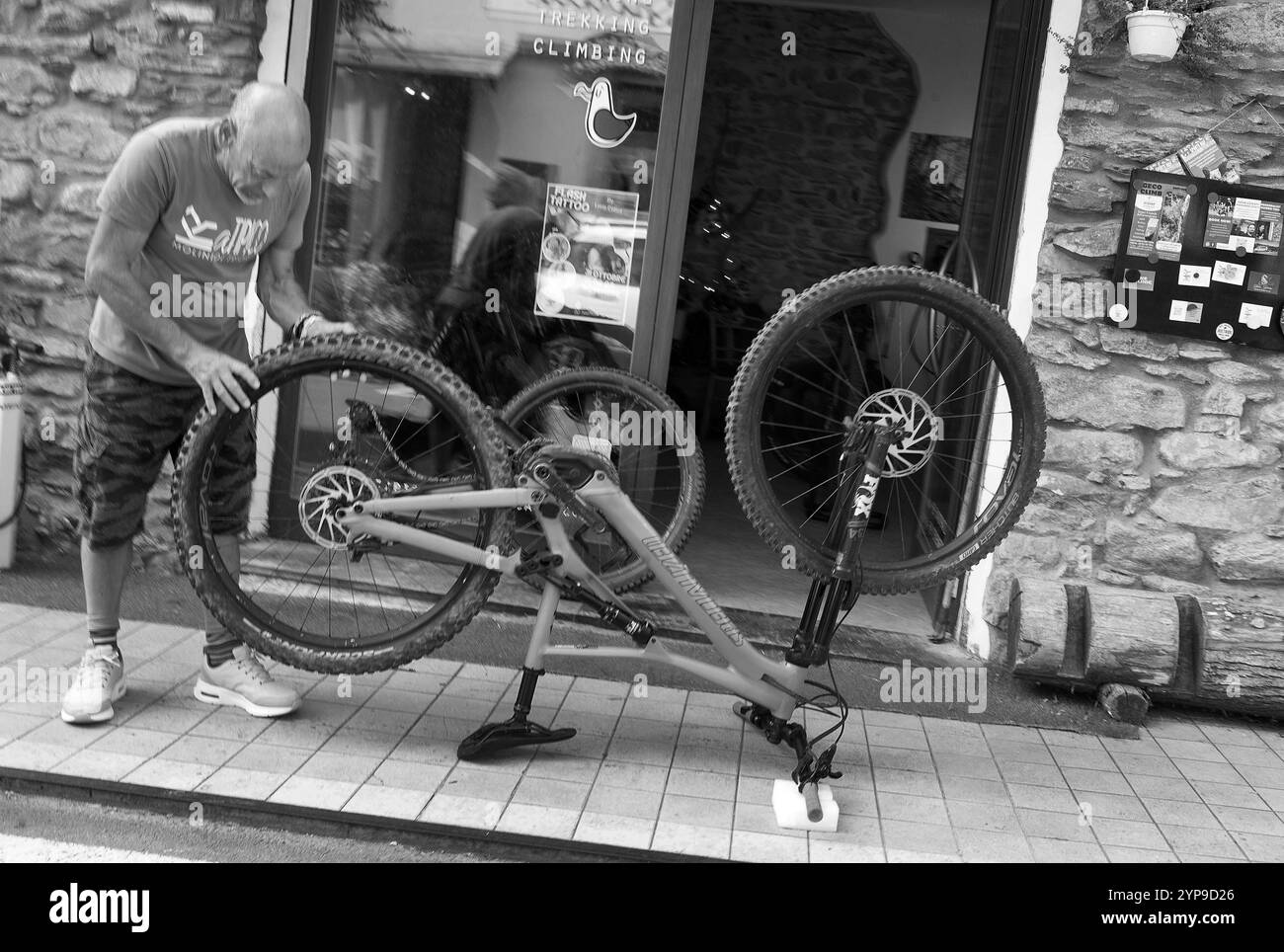 Cycle repair man, Molini de Triora, Argentina valley, Liguria, Italy ...