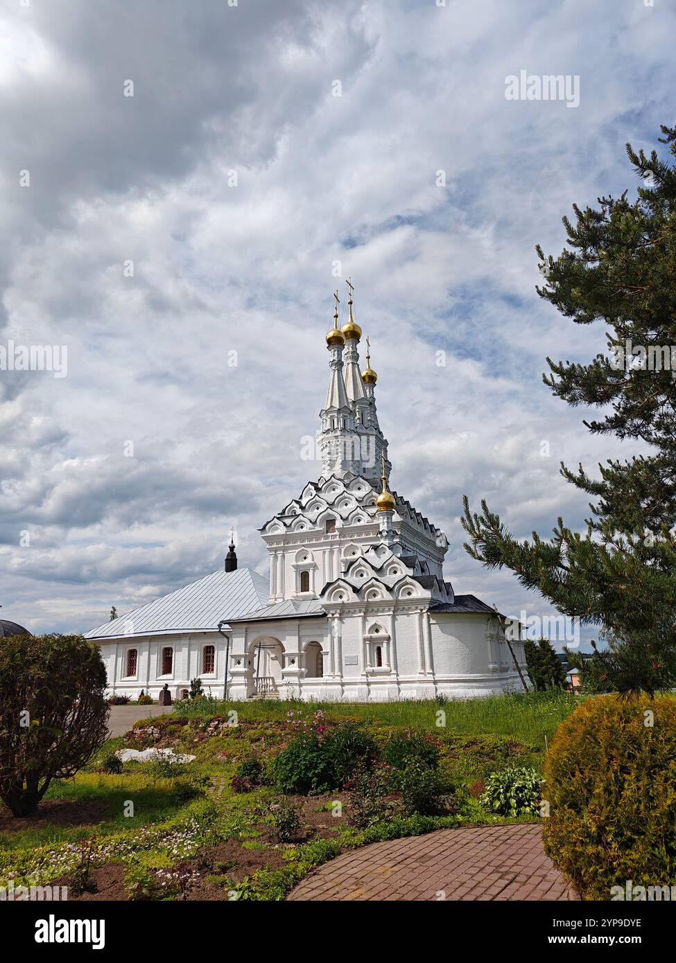 A stunning church features golden domes and intricate architecture ...