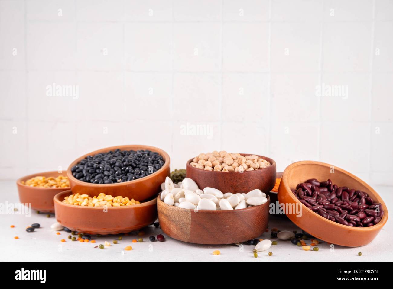 Various dried beans, lentils, mung, chickpea, pea assortment in wooden ...