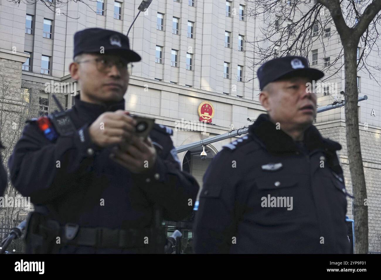 Beijing, Security officers stand guard outside the Beijing No. 2 ...