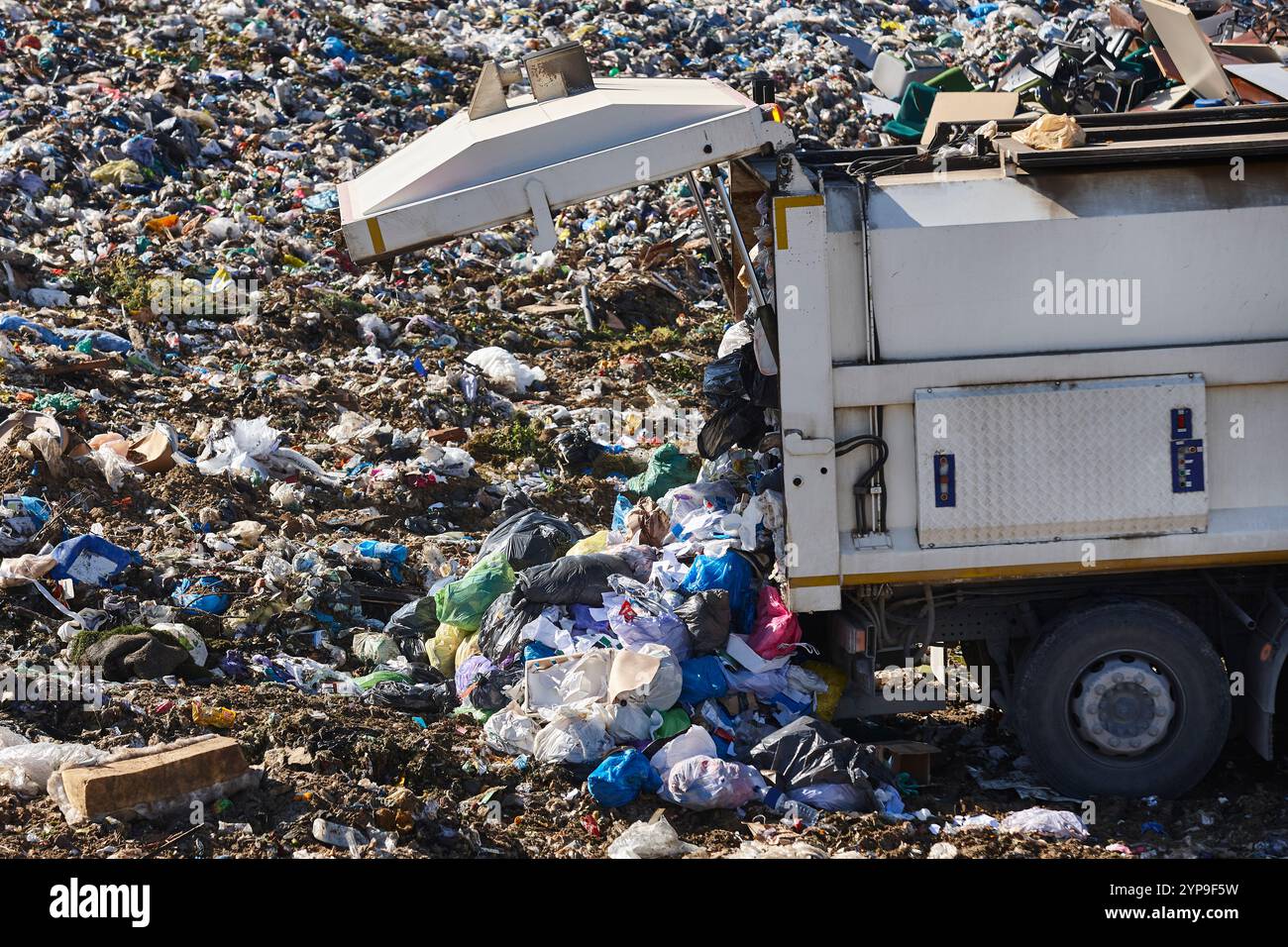 Truck unloading garbage on an open air dump. Waste recycling Stock ...
