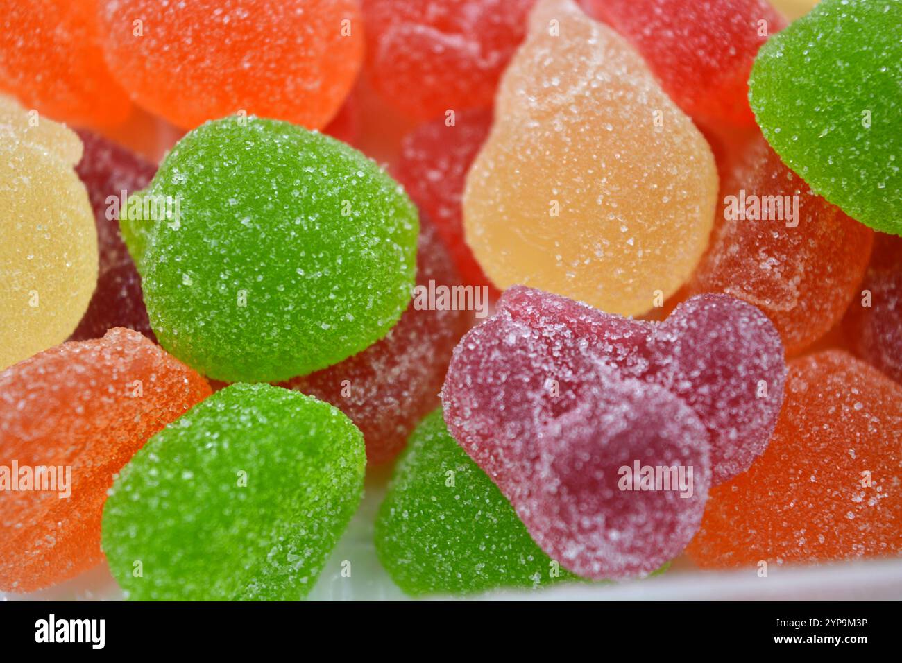 Colorful sweet candies made from natural fruit juice in the form of ...