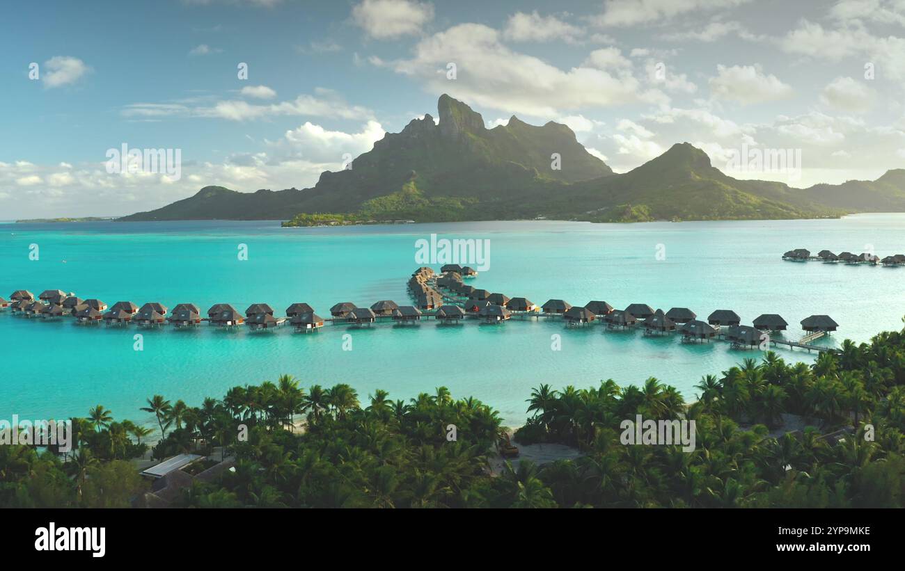 Breathtaking aerial view of turquoise lagoon, palm trees beach ...