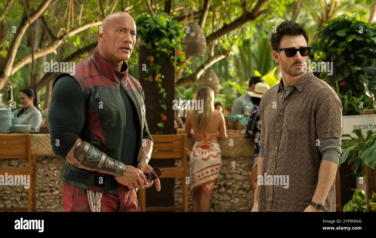 DWAYNE "THE ROCK" JOHNSON and CHRIS EVANS in RED ONE (2024), directed by JAKE KASDAN. Credit ...