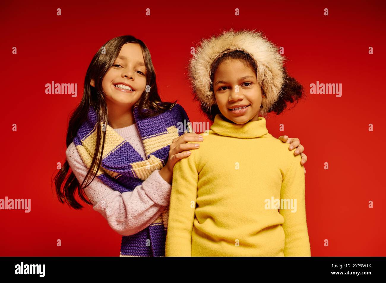 Two girls smiling in winter hi-res stock photography and images - Alamy