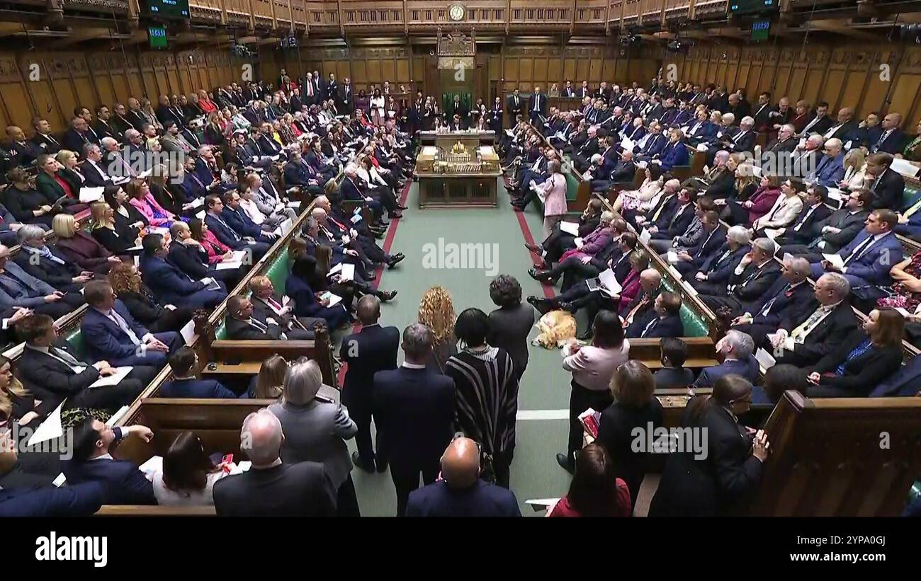 Screen grab of the benches filled with MPs during the debate of the ...