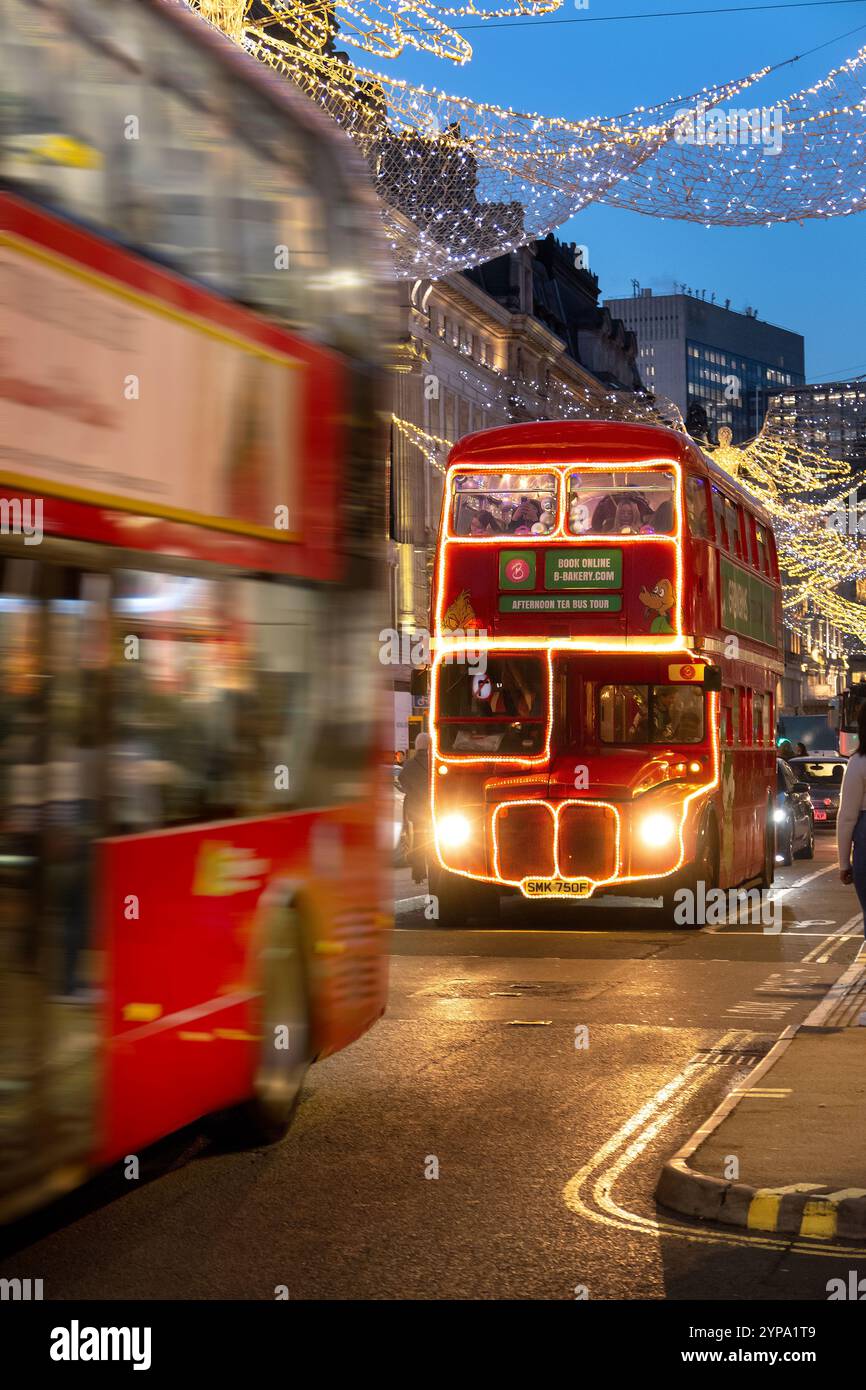 London bus covered in Christmas lights in Regents Street Christmas 2024 ...