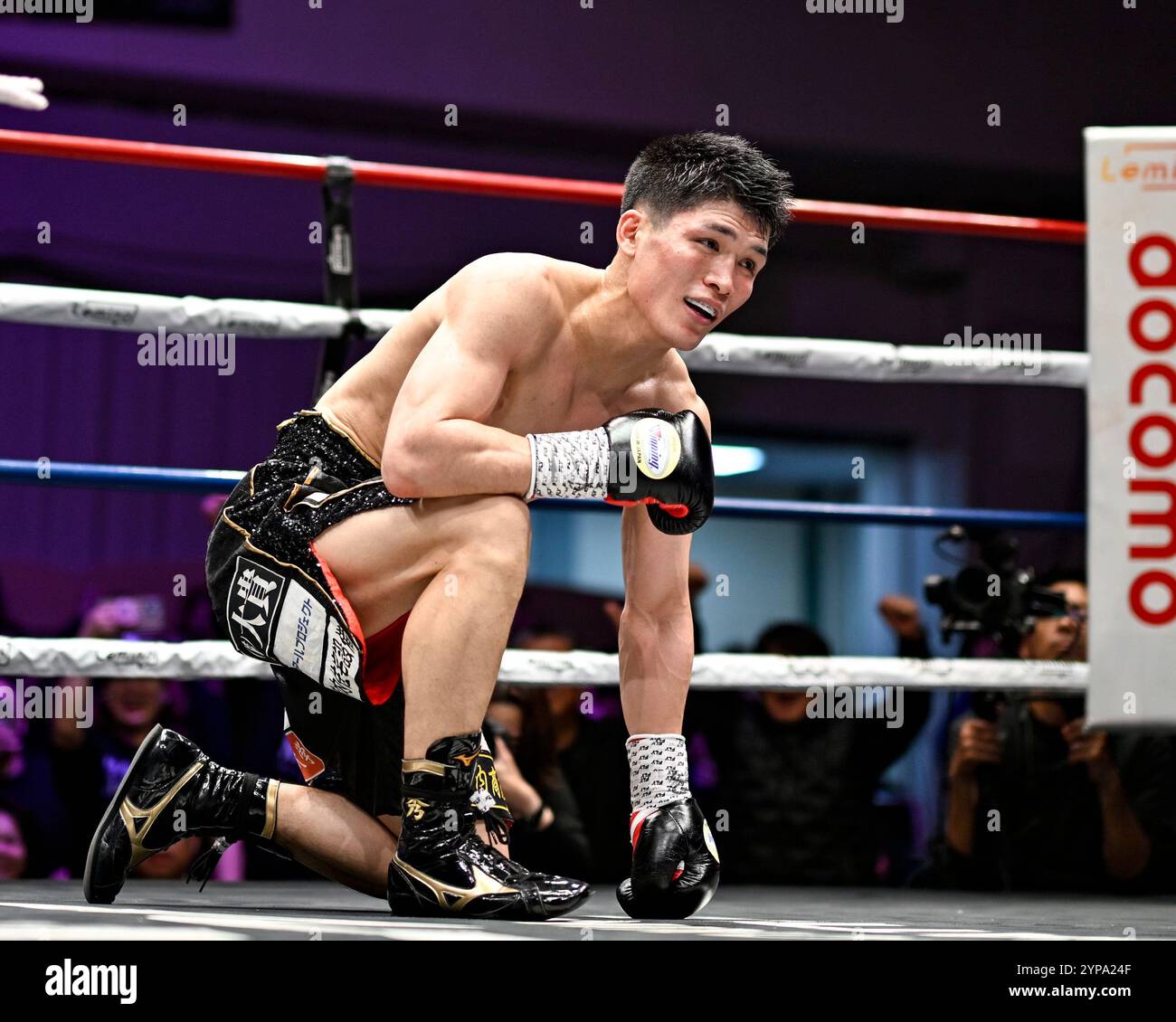 Tokyo, Japan. 21st Nov, 2024. Shu Utsuki is knocked down by Katsuya Yasuda (not pictured) in the ...