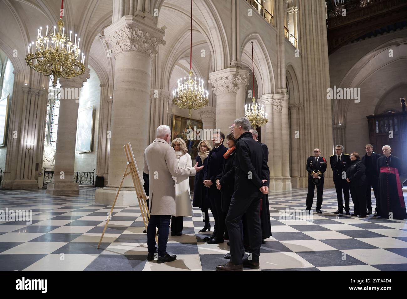French President Emmanuel Macron, center, and his wife Brigitte Macron ...