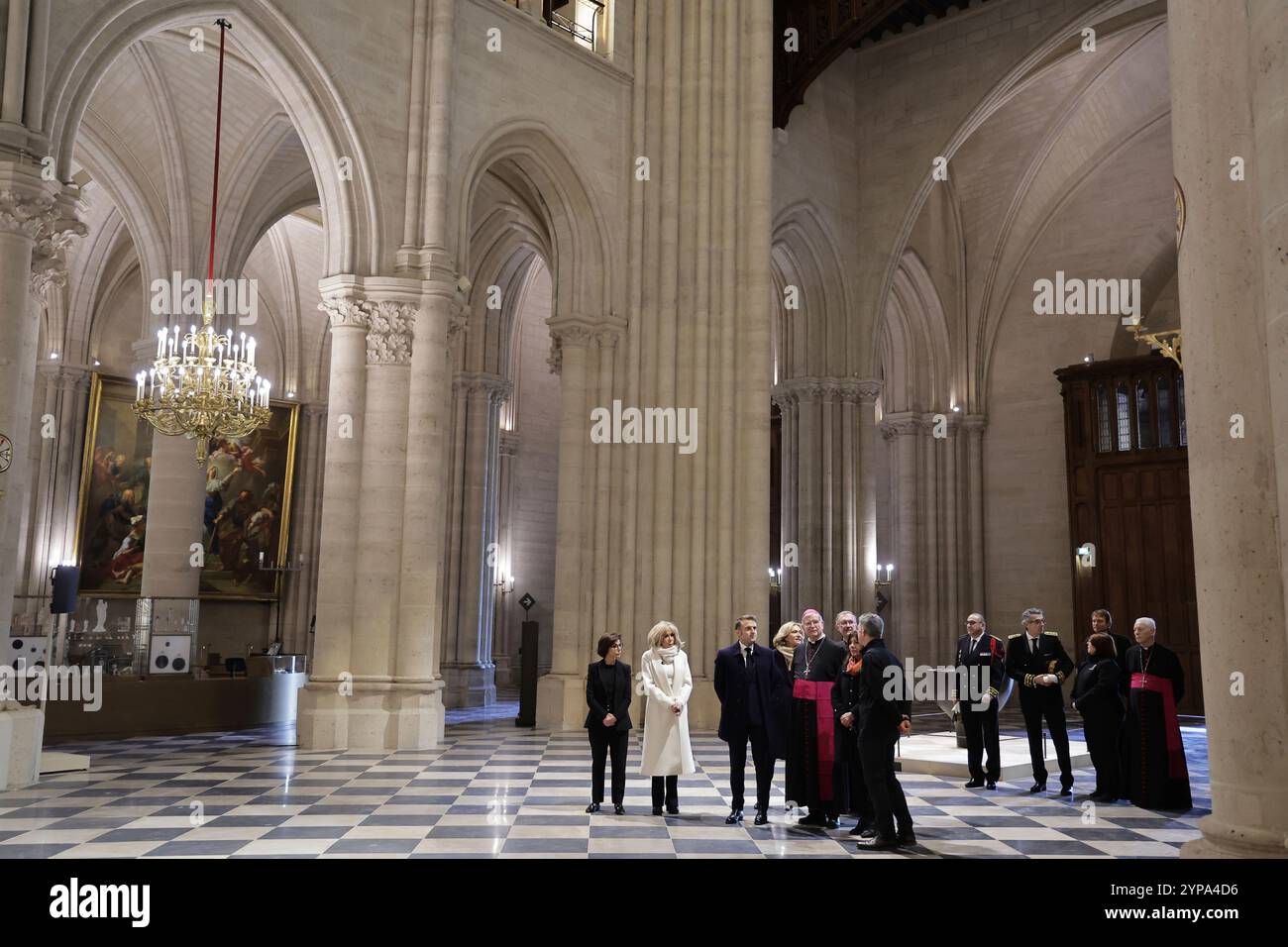 French President Emmanuel Macron, third left, and his wife Brigitte ...