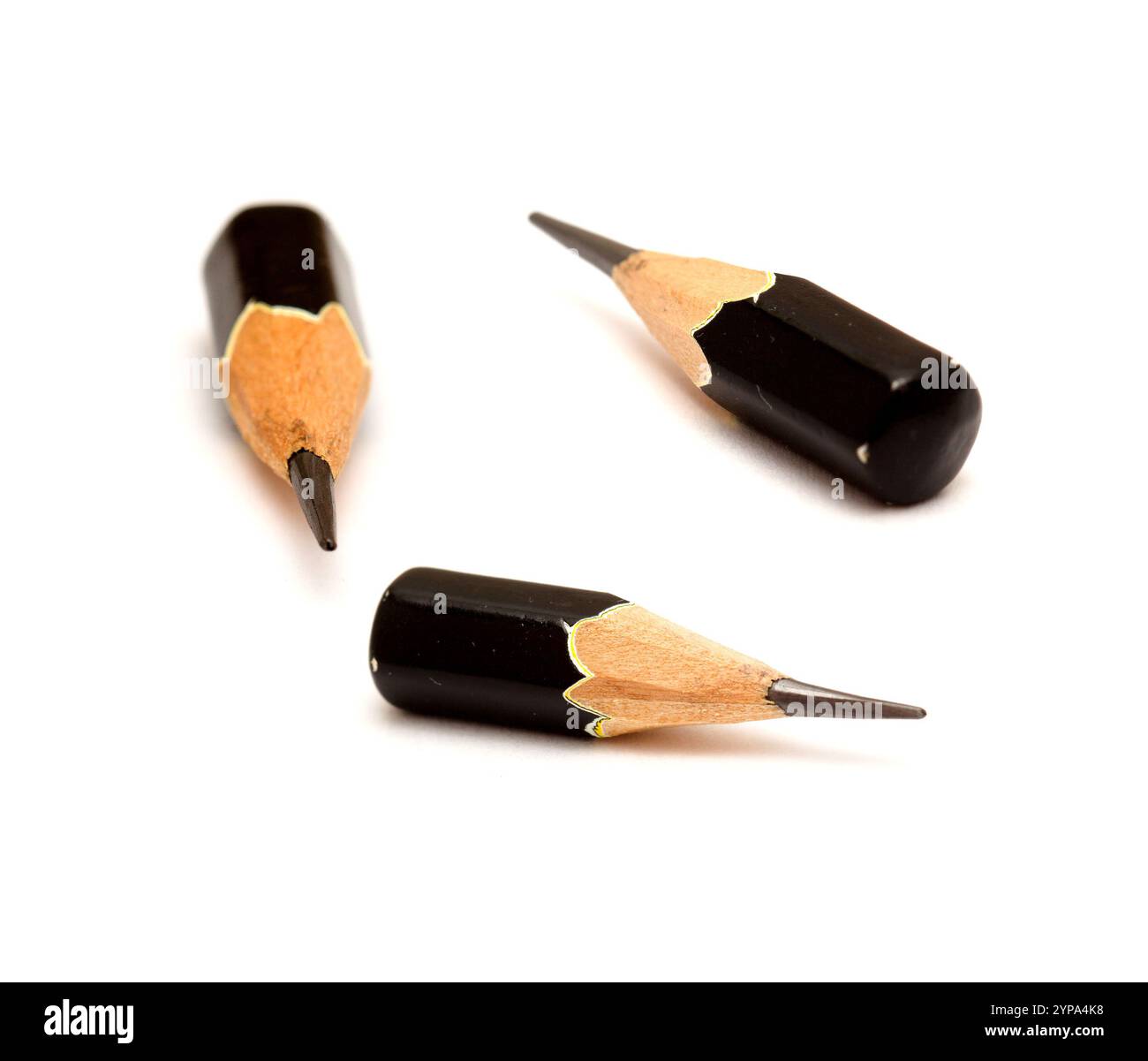 very short stub of a graphite pencil, sharpened, isolated on White ...