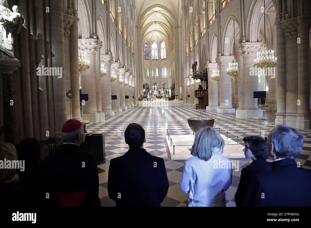 French President Emmanuel Macron, center left, and his wife Brigitte ...