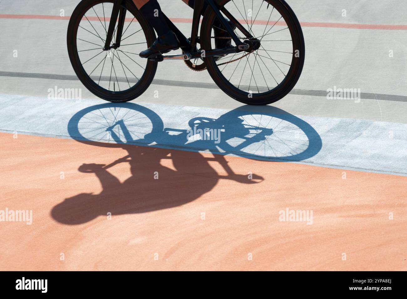 Cast Shadow of a Cyclist on the Velodrome Stock Photo - Alamy