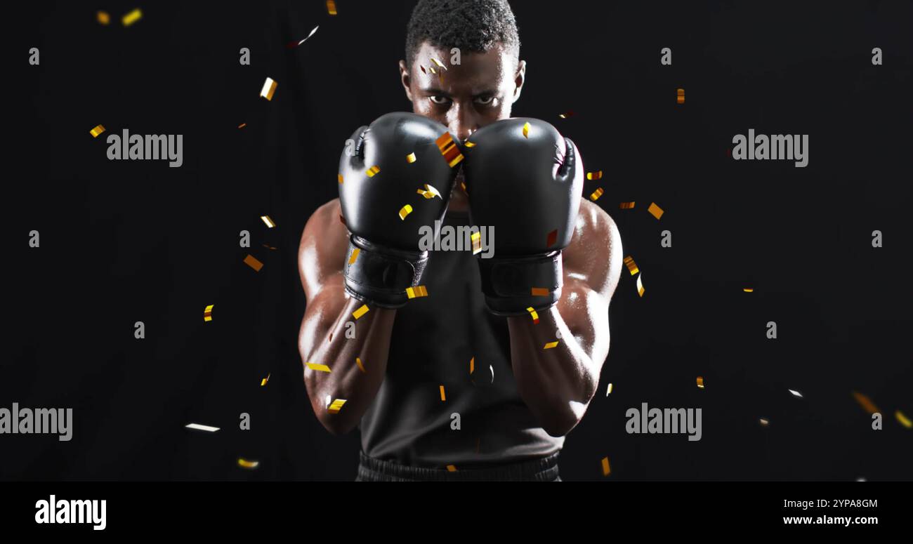 Image of confetti falling over african american male boxer on black ...