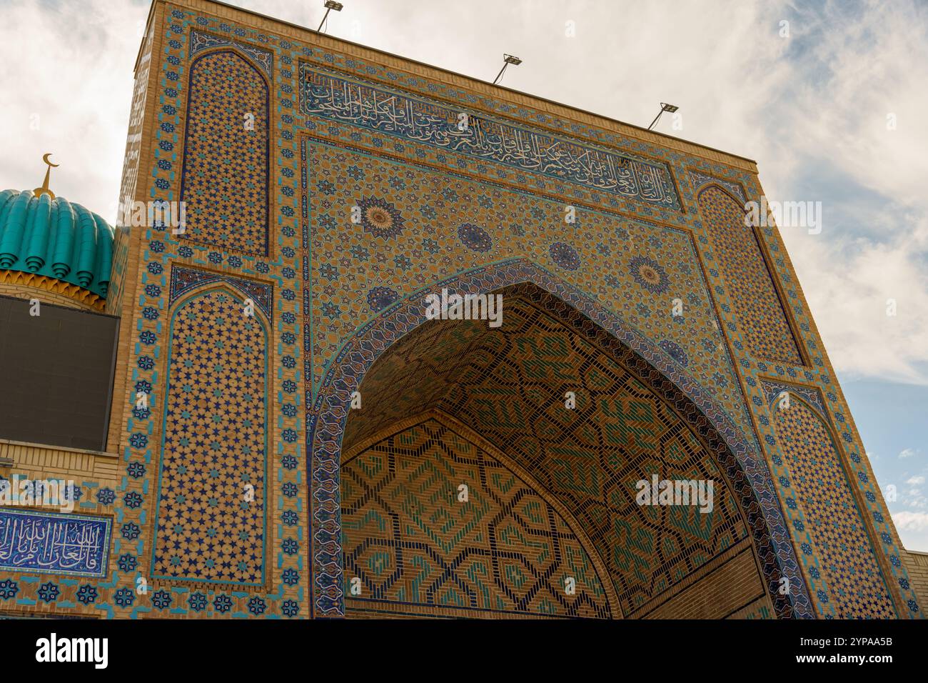 The archway of a building is decorated with intricate designs Stock ...