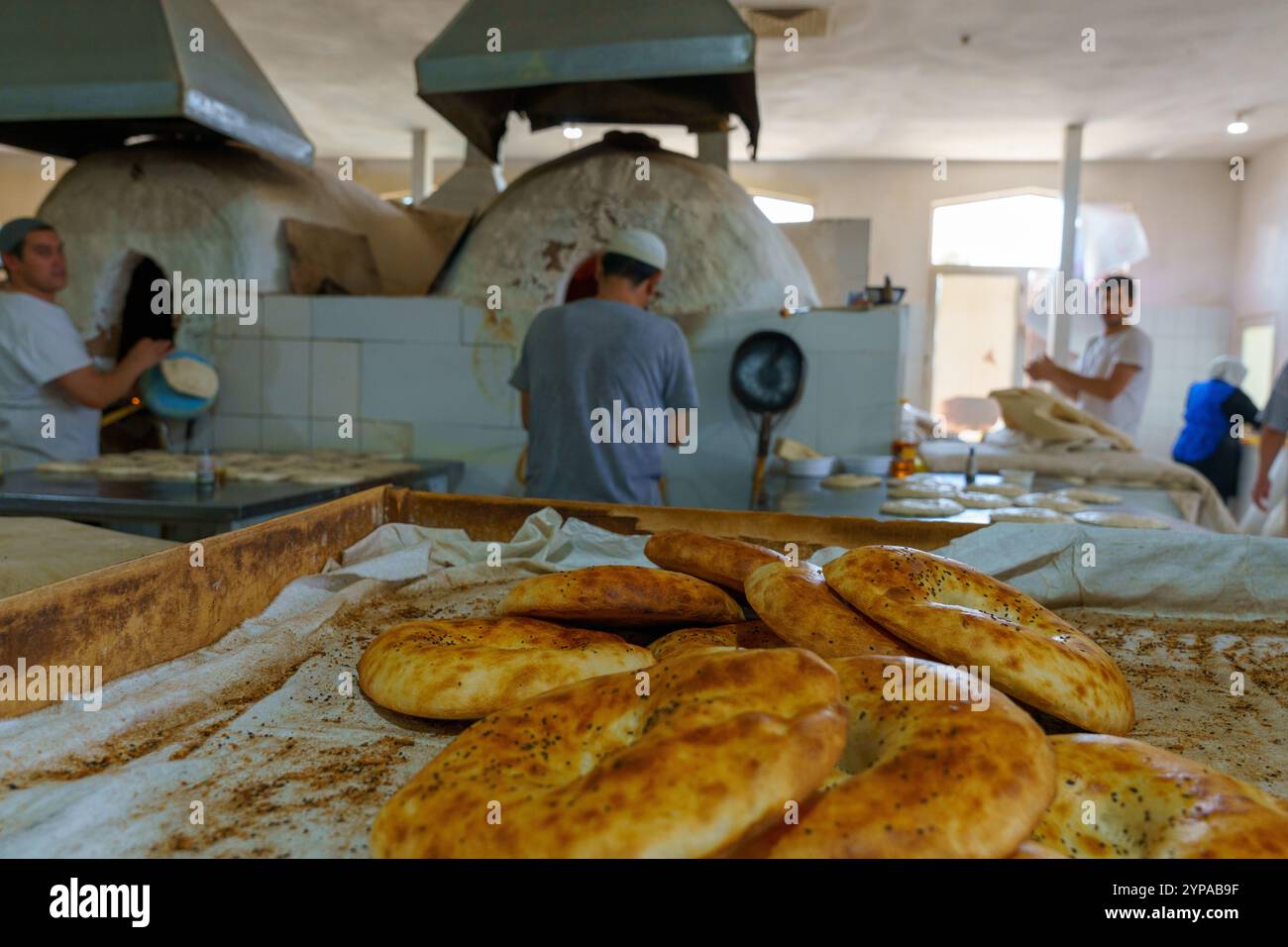 People making bread hi-res stock photography and images - Alamy